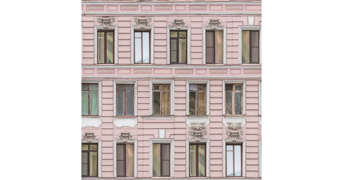 Pink Facade - mural wallpaper with pink houses -Rebel Walls